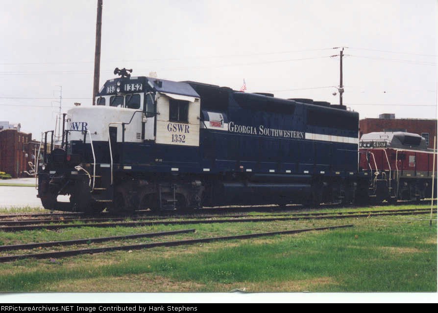 GSWR 1352 poses for a roster shot at Culumbus, GA. This unit is a former N&W high hood GP40, now ...